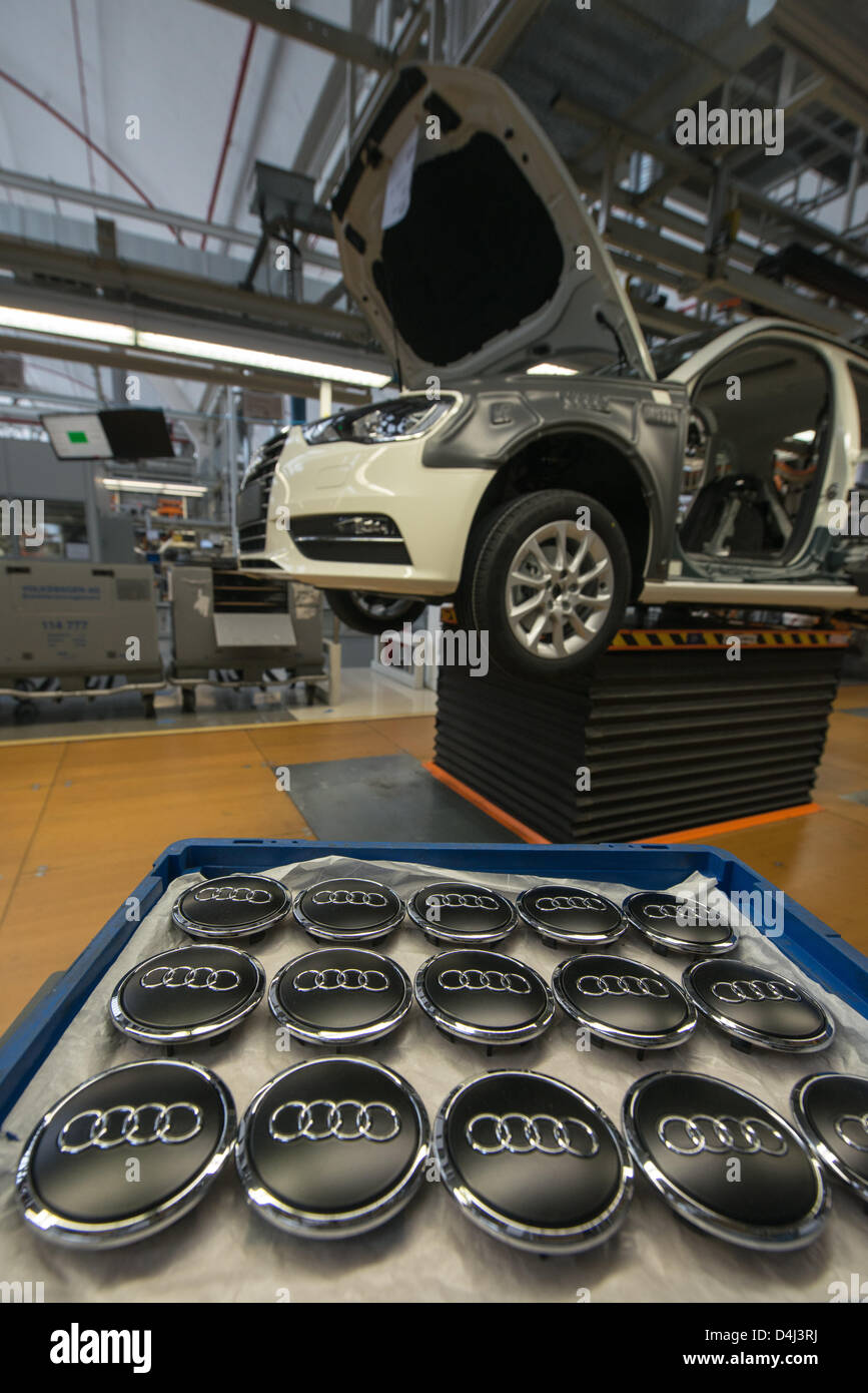 Audi emblems are ready to be mounted onto Audi A3's on the production ...