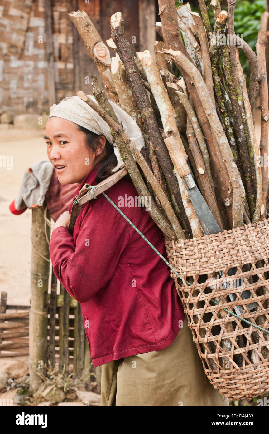 portrait of an ethnic Akha woman and her wood basket, Phongsaly, Laos Stock Photo - Alamy
