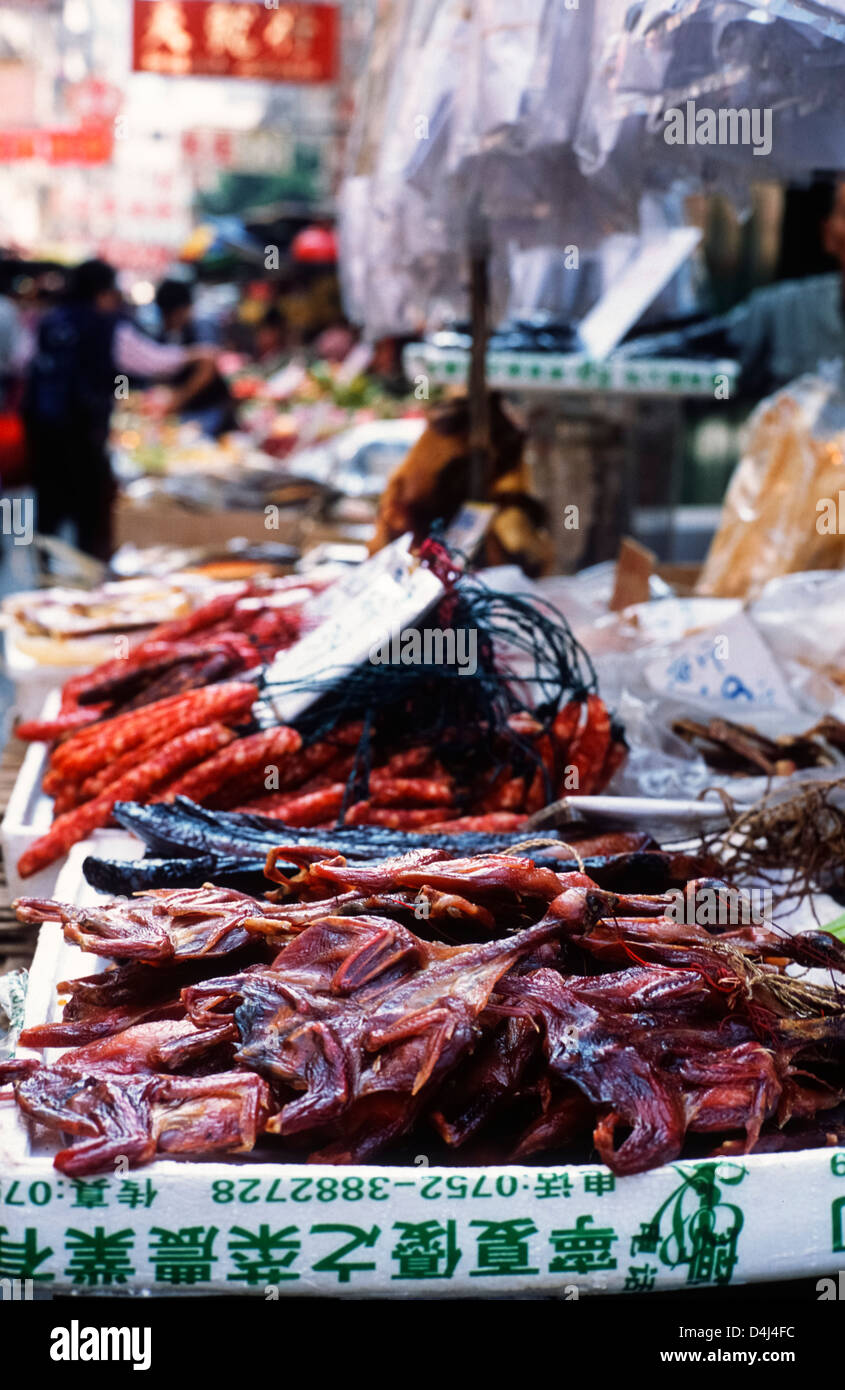 Market stall selling poultry and meats Kowloon Hong Kong China Stock ...