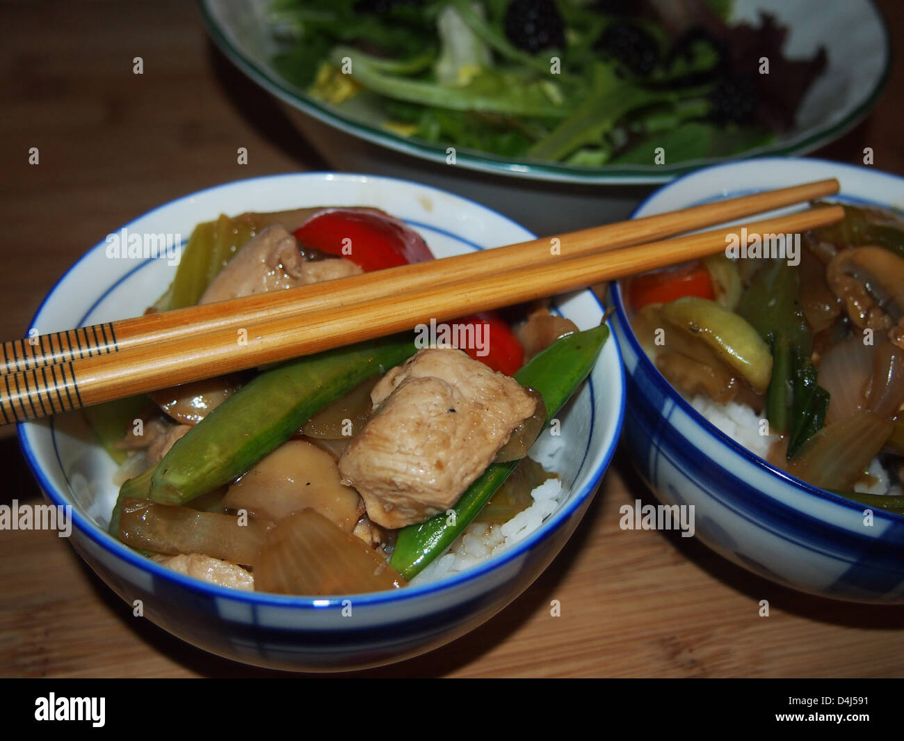 Chinese food and chop sticks Stock Photo - Alamy