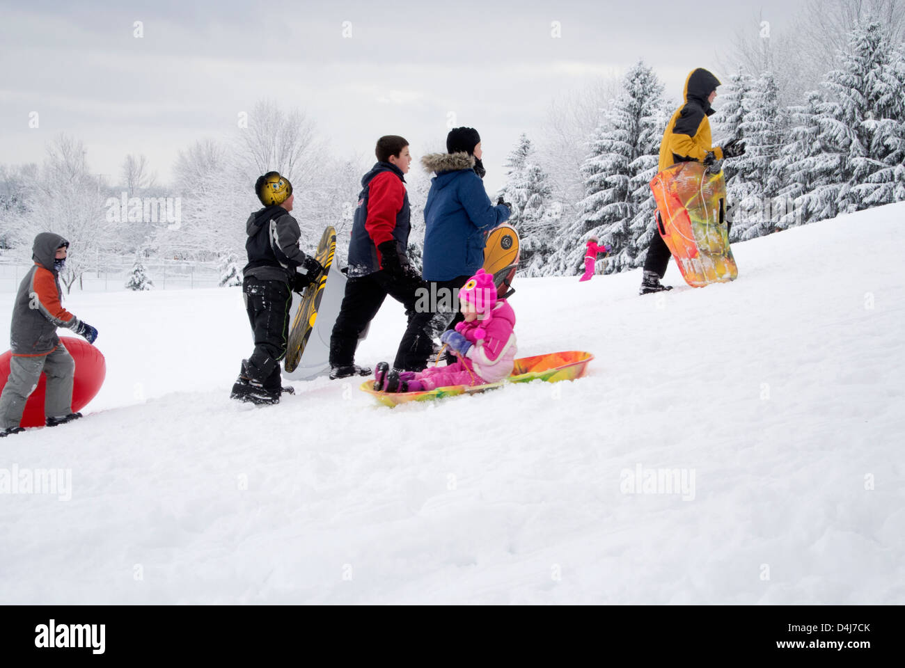 Children with sled hi-res stock photography and images - Alamy