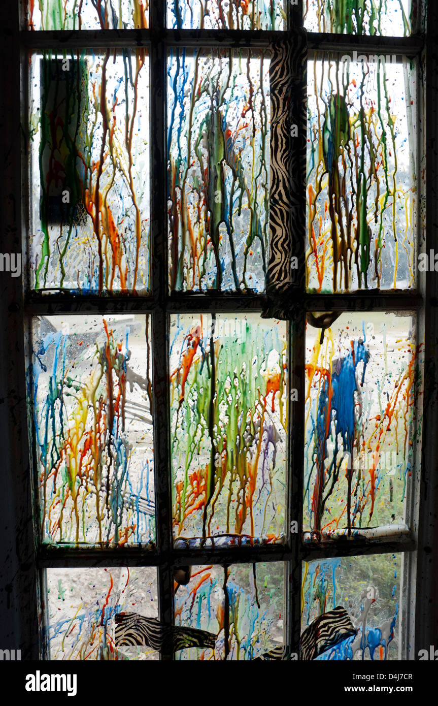 Paint spattered door at a commercial painting company Stock Photo - Alamy