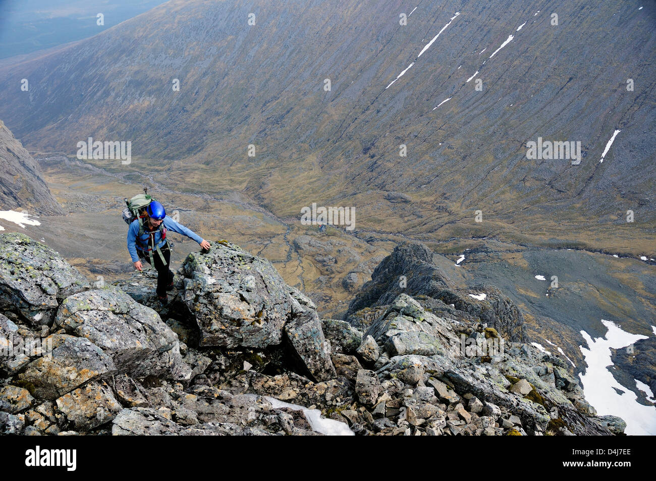 A climber on the lower part of Tower Ridge, a classic route on Ben ...