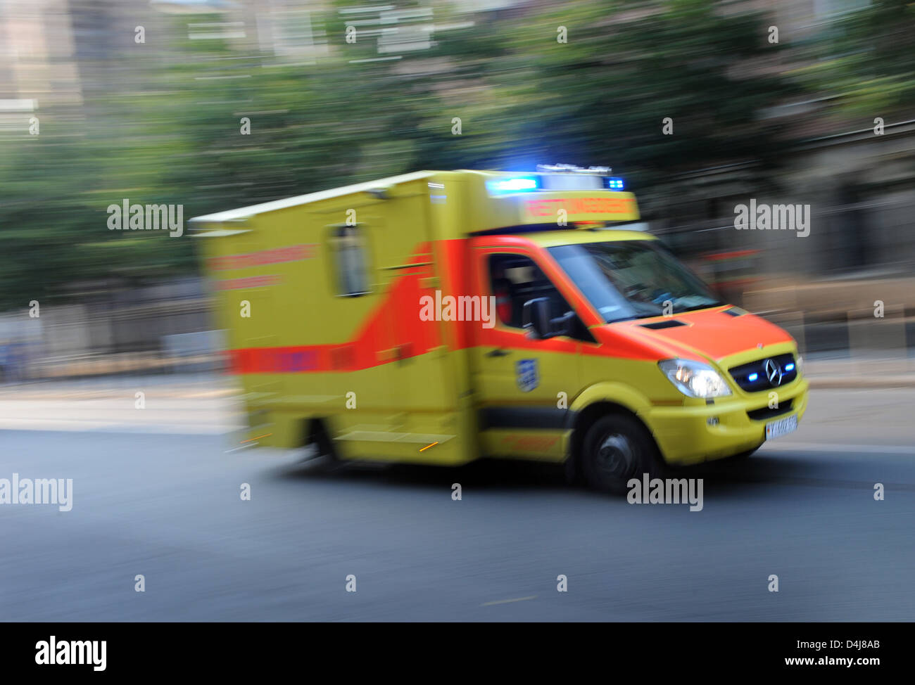 Berlin, Germany, Ambulance in Orange in Berlin-Mitte Stock Photo - Alamy