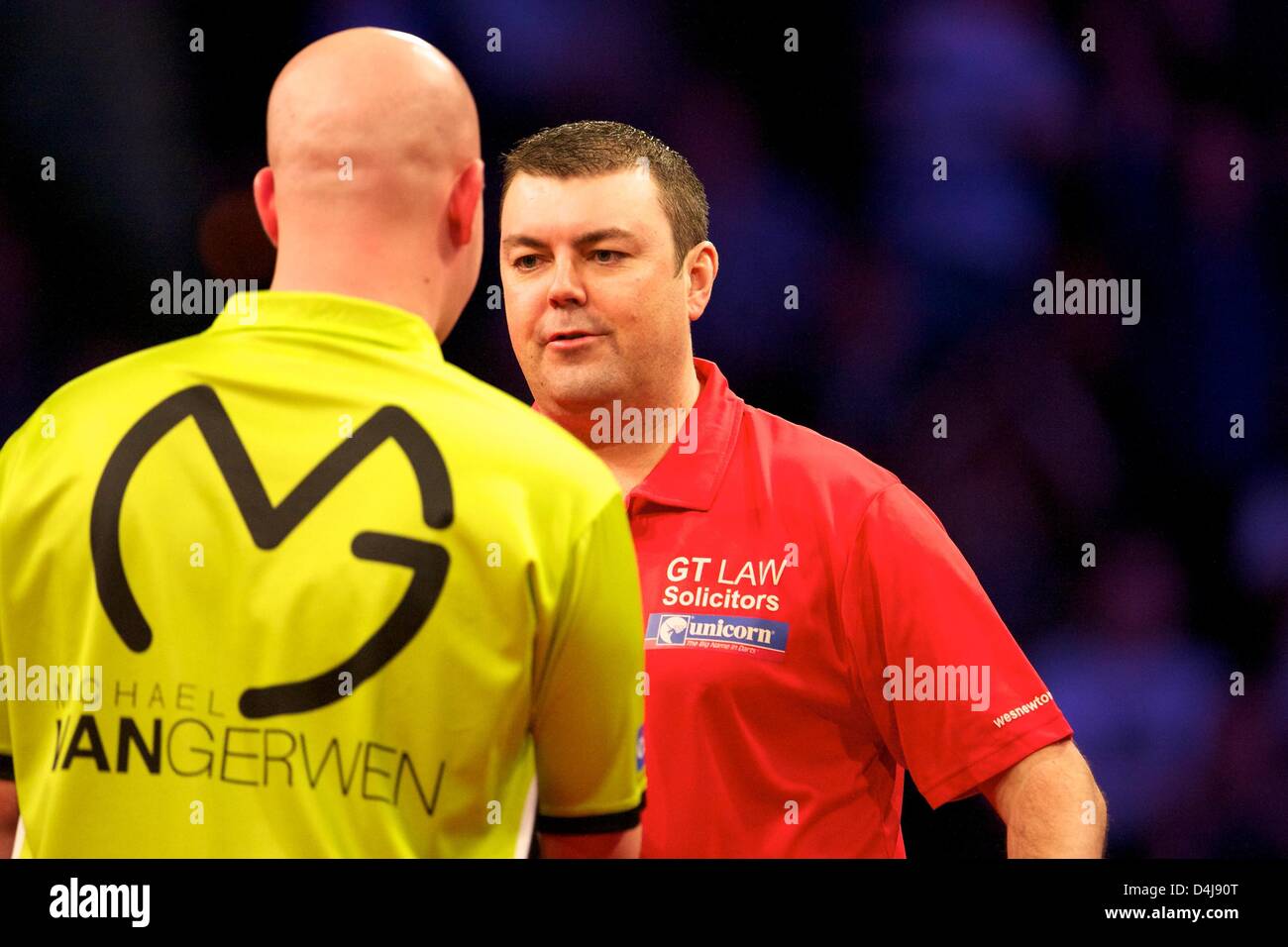 Manchester, UK. 14th March 2013. Wes Newton looses to Michael van ...