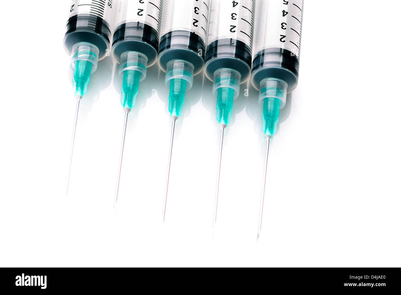 Closeup, Isolated disposable syringe Stock Photo - Alamy