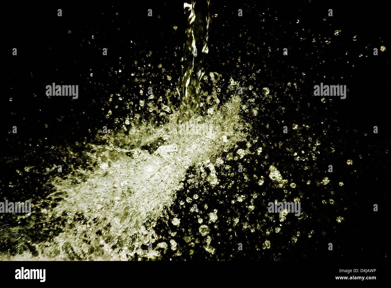 stream of water falling down on black background Stock Photo - Alamy