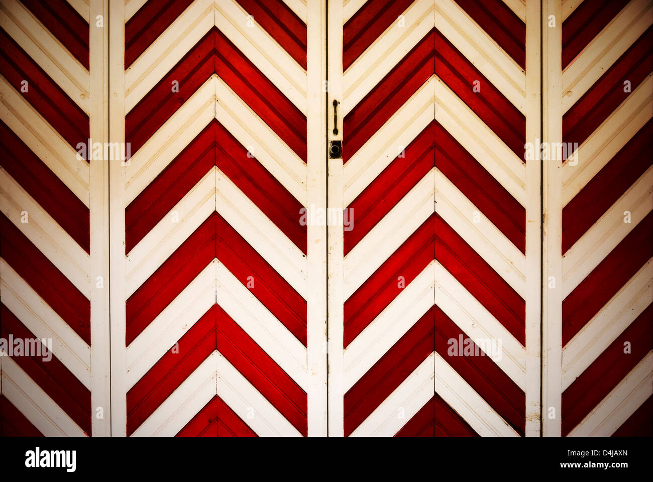 garage door with red and white diagonal lines Stock Photo - Alamy