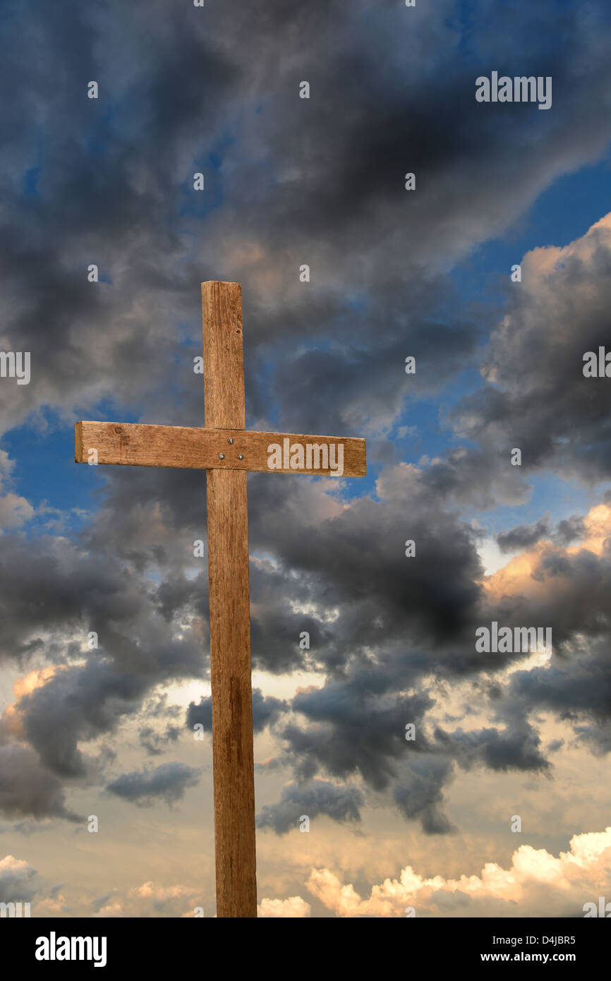 Rugged wooden cross over sunset sky Stock Photo - Alamy