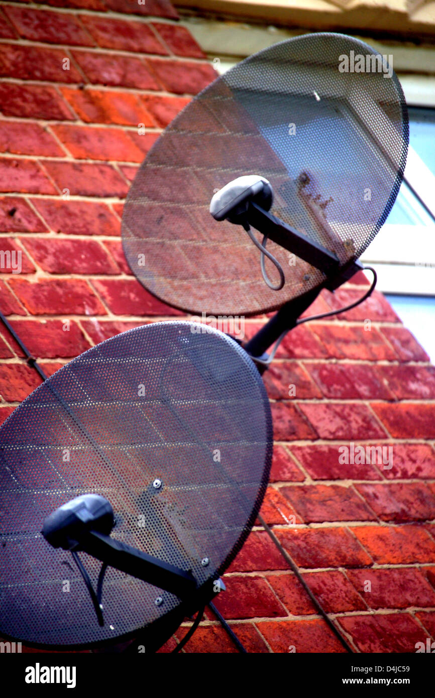 Satellite dishes on rooftop Stock Photo - Alamy