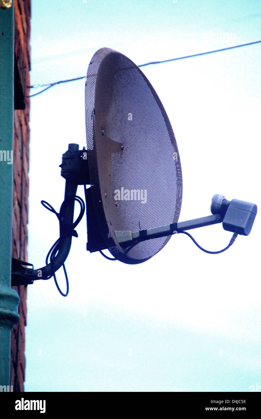 Satellite dish on rooftop Stock Photo - Alamy