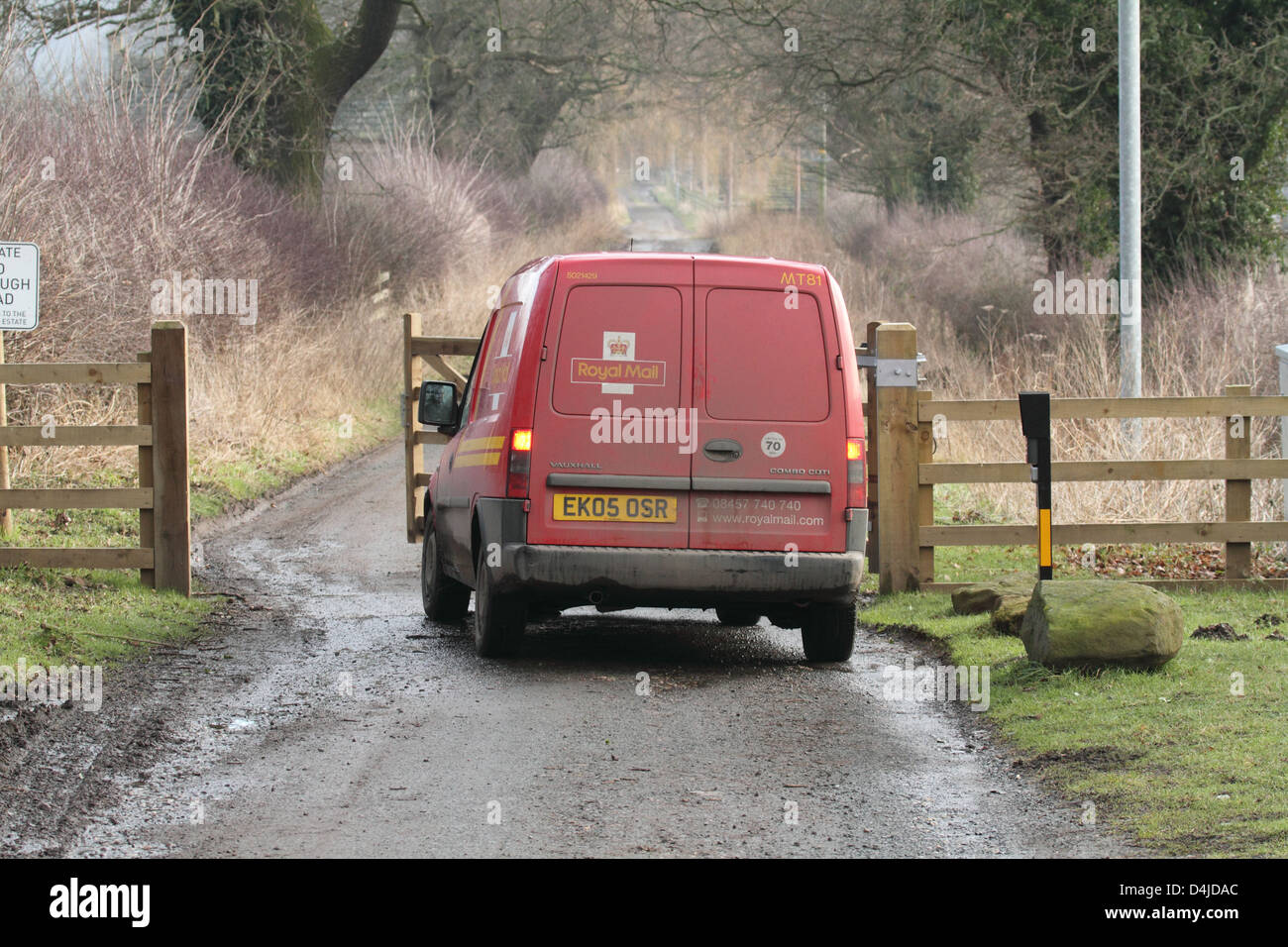 royal mail post van delivering to remote country location Stock Photo ...