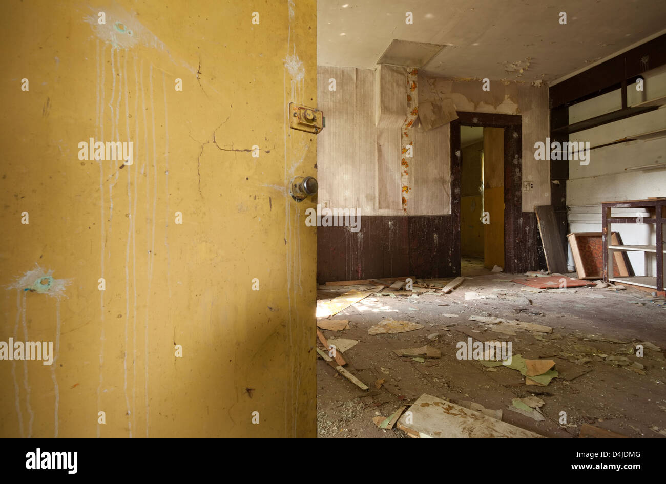 A weathered door and messy room of an abandoned house in Ontario ...