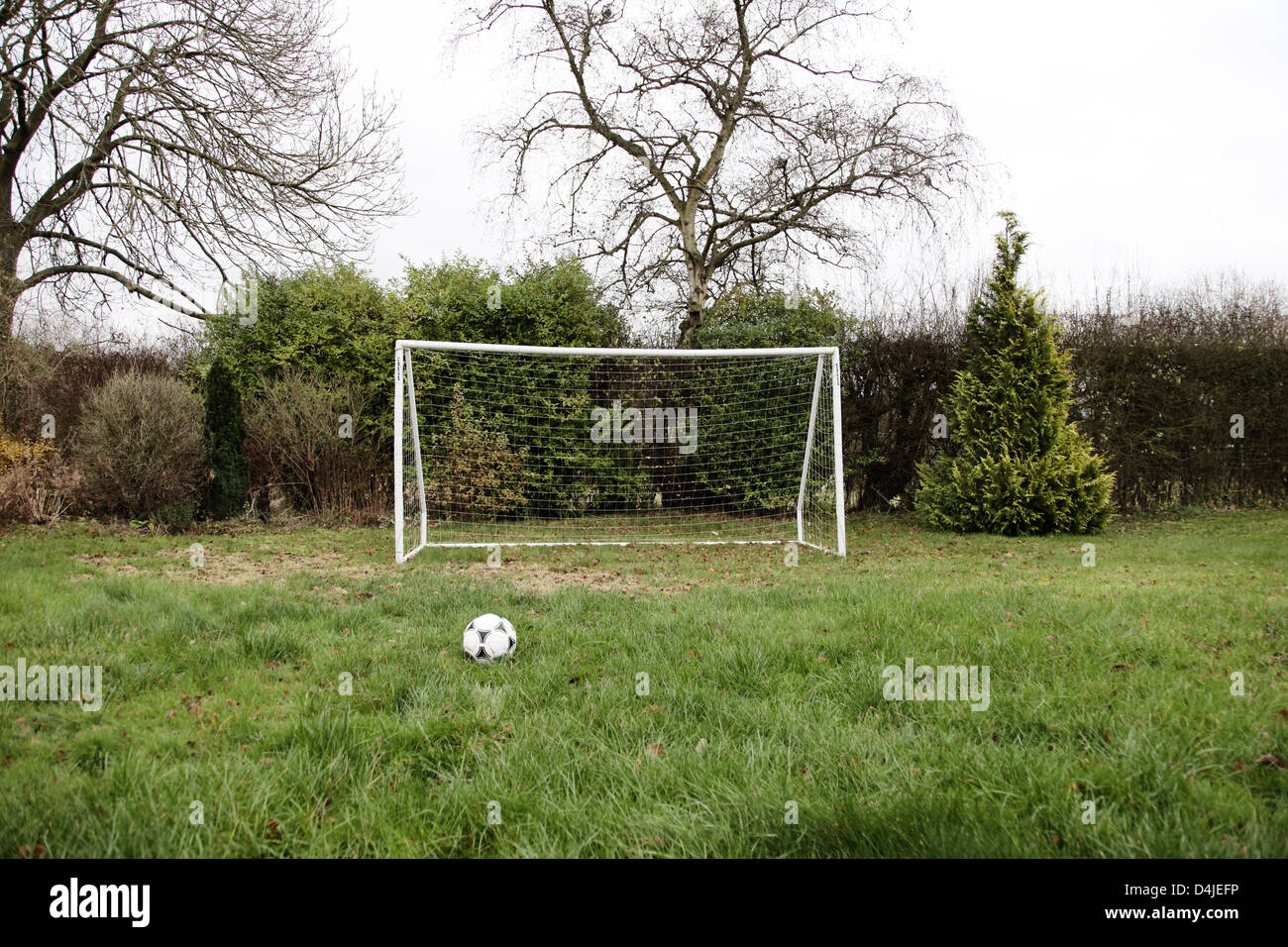 It's a photo of a small football field in the back garden park of a ...