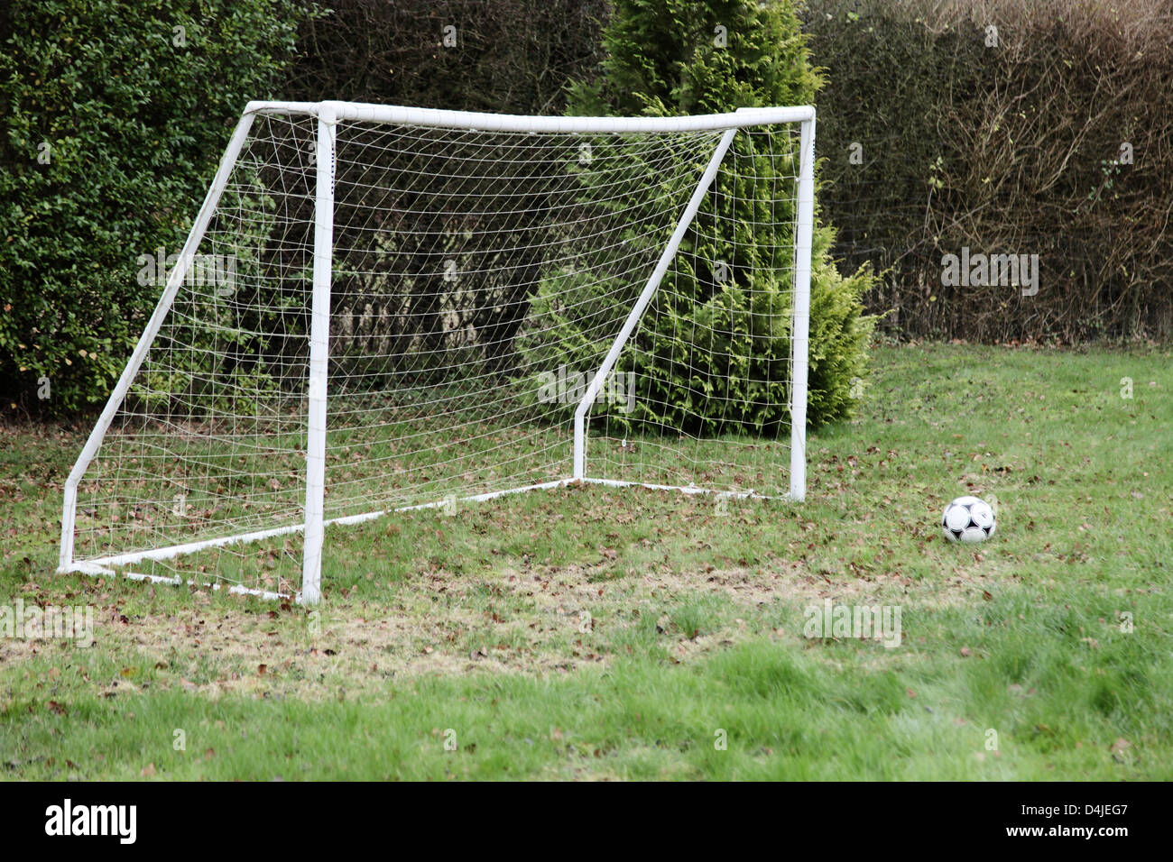It's a photo of a small football field in the back garden park of a ...