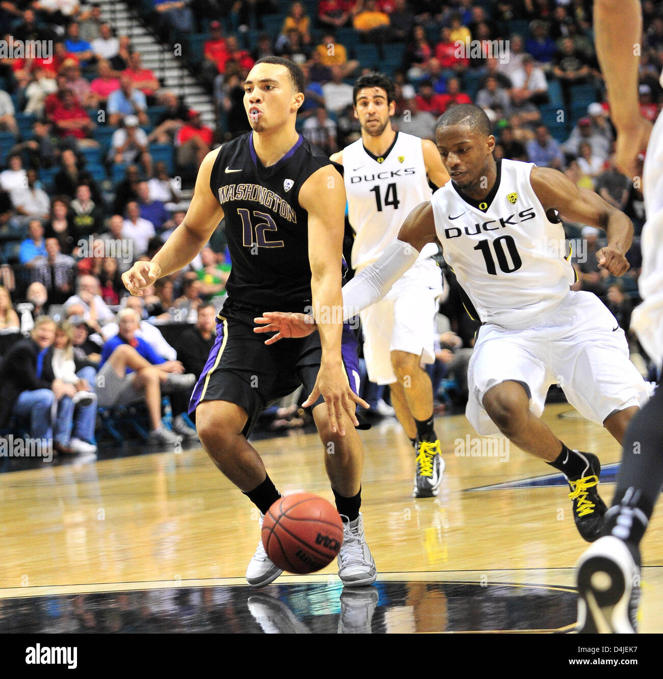 March 13, 2013: Andrew Andrews #12 of Washington has the ball stolen by ...
