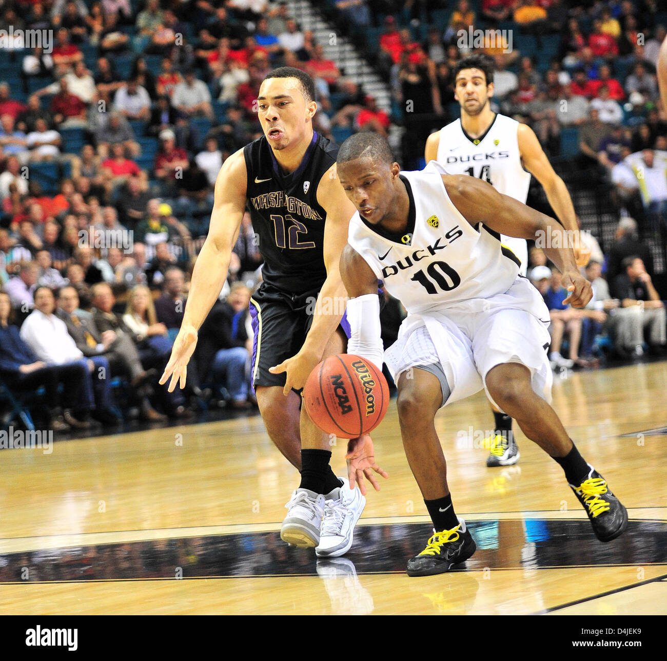 March 13, 2013: Andrew Andrews #12 of Washington has the ball stolen by ...