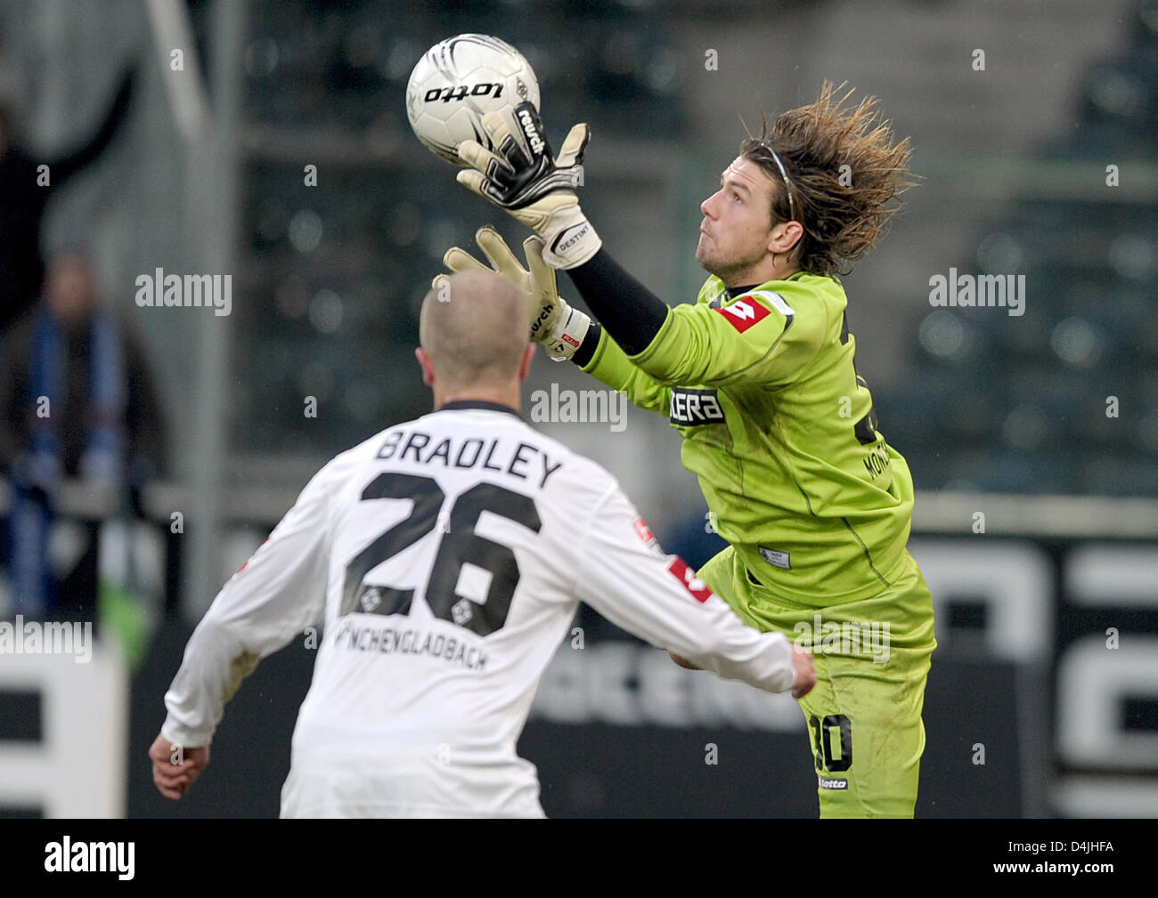 Gladbach?s goalkeeper Logan Bailly (R) and teammate Michael Bradley ...