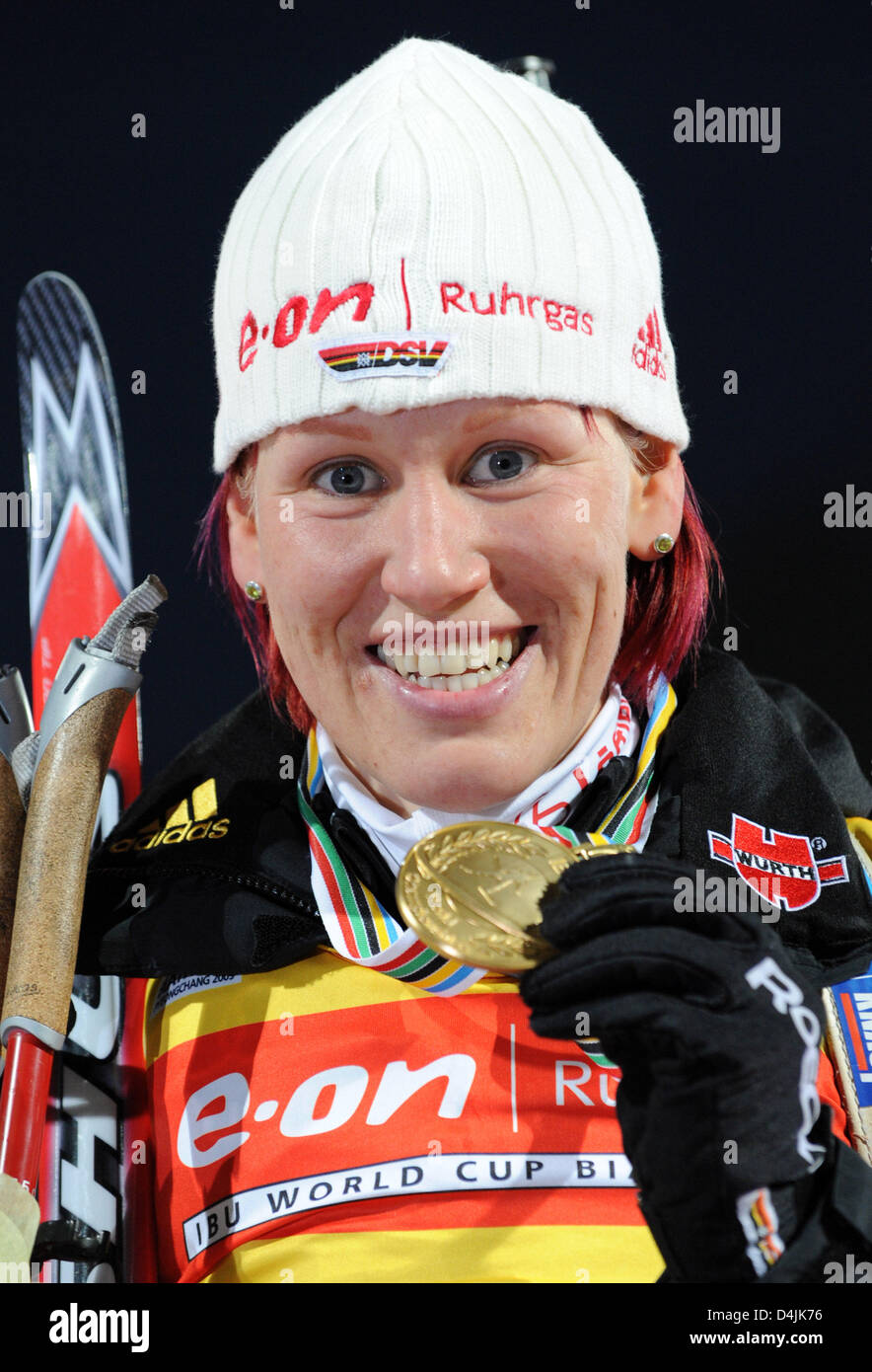 German biathlet Kati Wilhelm shows her gold medal at the Biathlon World ...