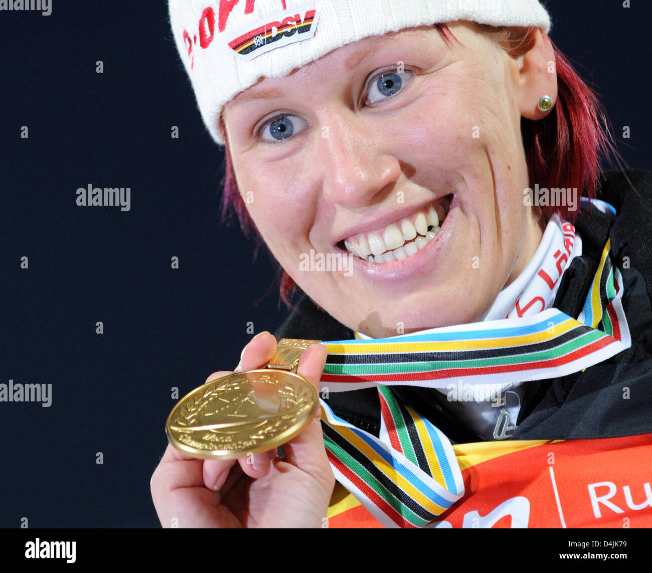 German biathlet Kati Wilhelm shows her gold medal at the Biathlon World ...