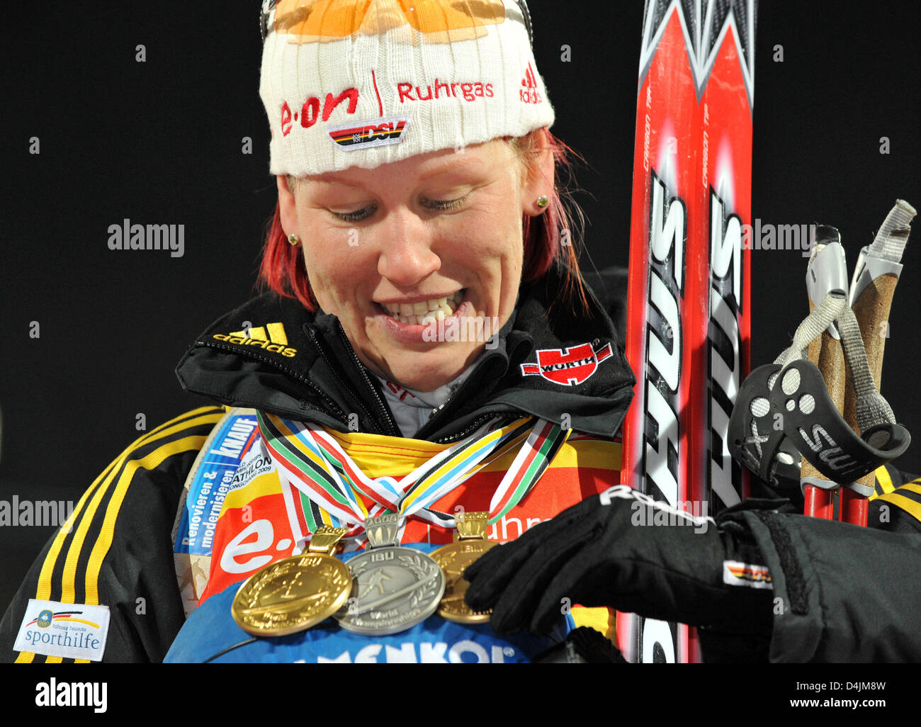 German Kati Wilhelm presents her medals after the women?s single ...
