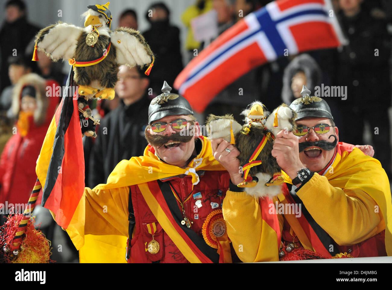 German supporters celebrate after German Kati Wilhelm won the women?s ...