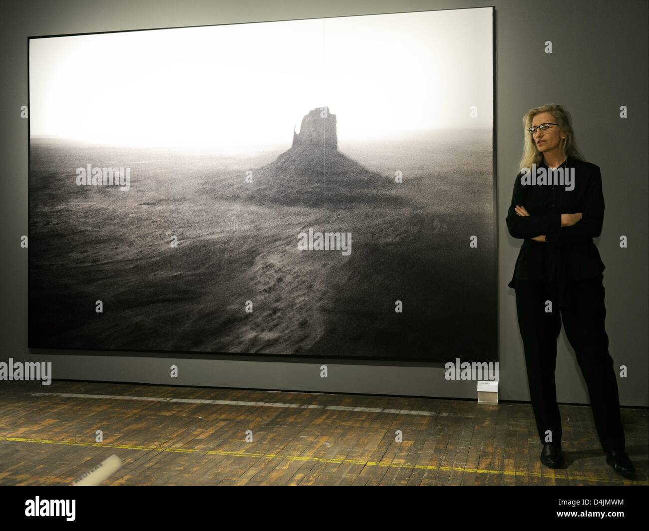 US photographer Annie Leibovitz stands next to one of her works on ...