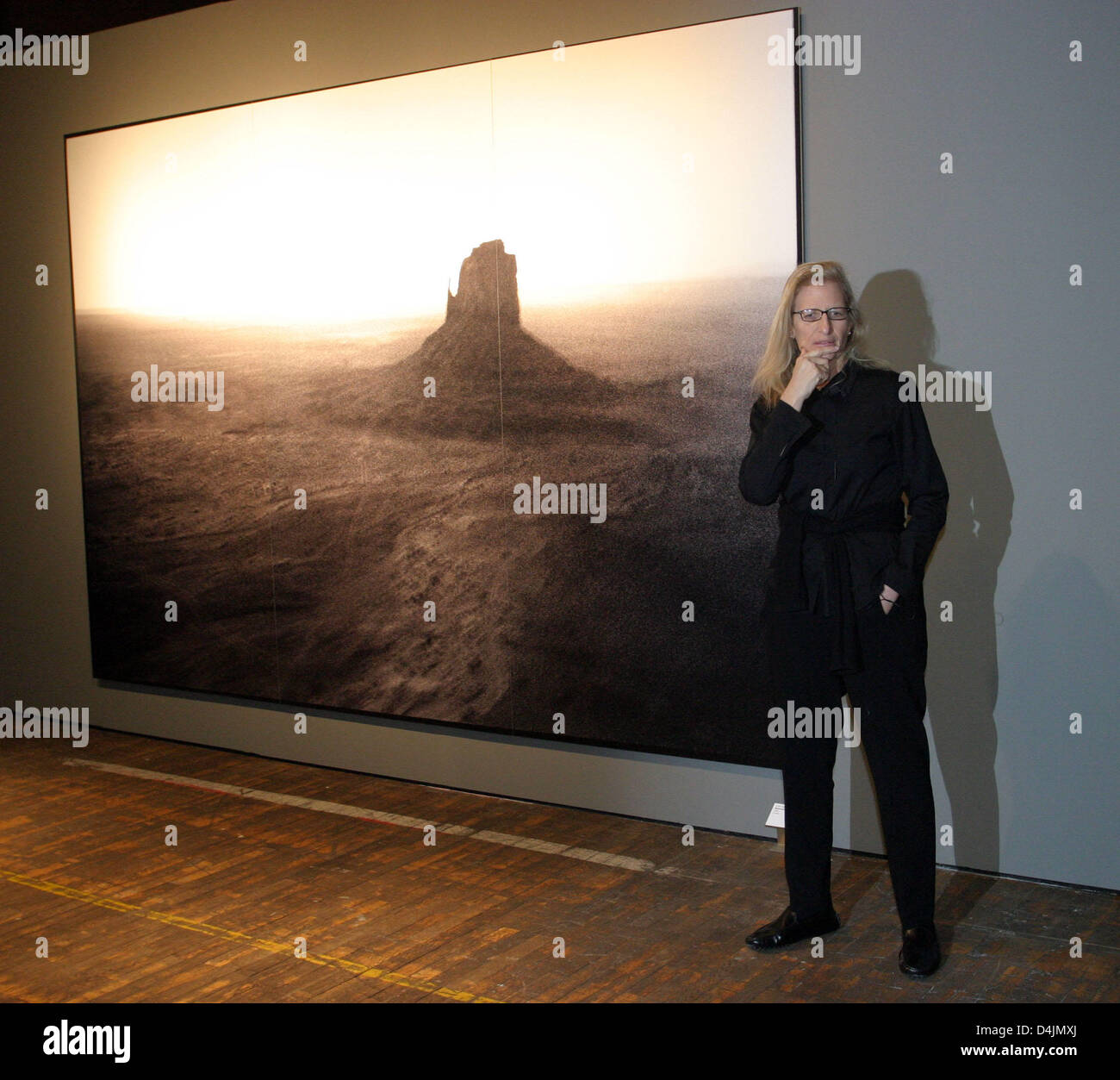US photographer Annie Leibovitz stands next to one of her works on ...