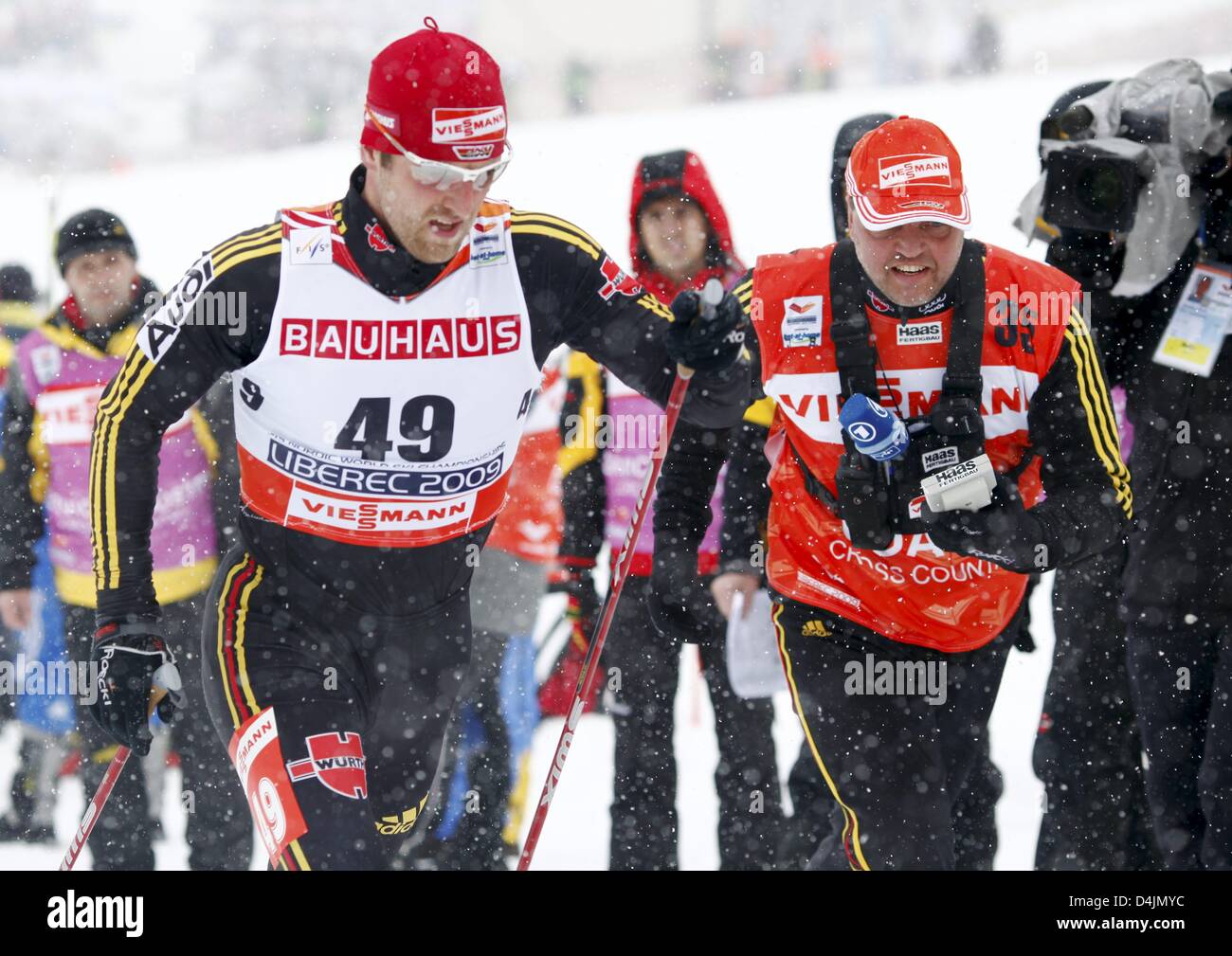 Germany?s Axel Teichmann (L) is cheered by head coach Jochen Behle (R ...