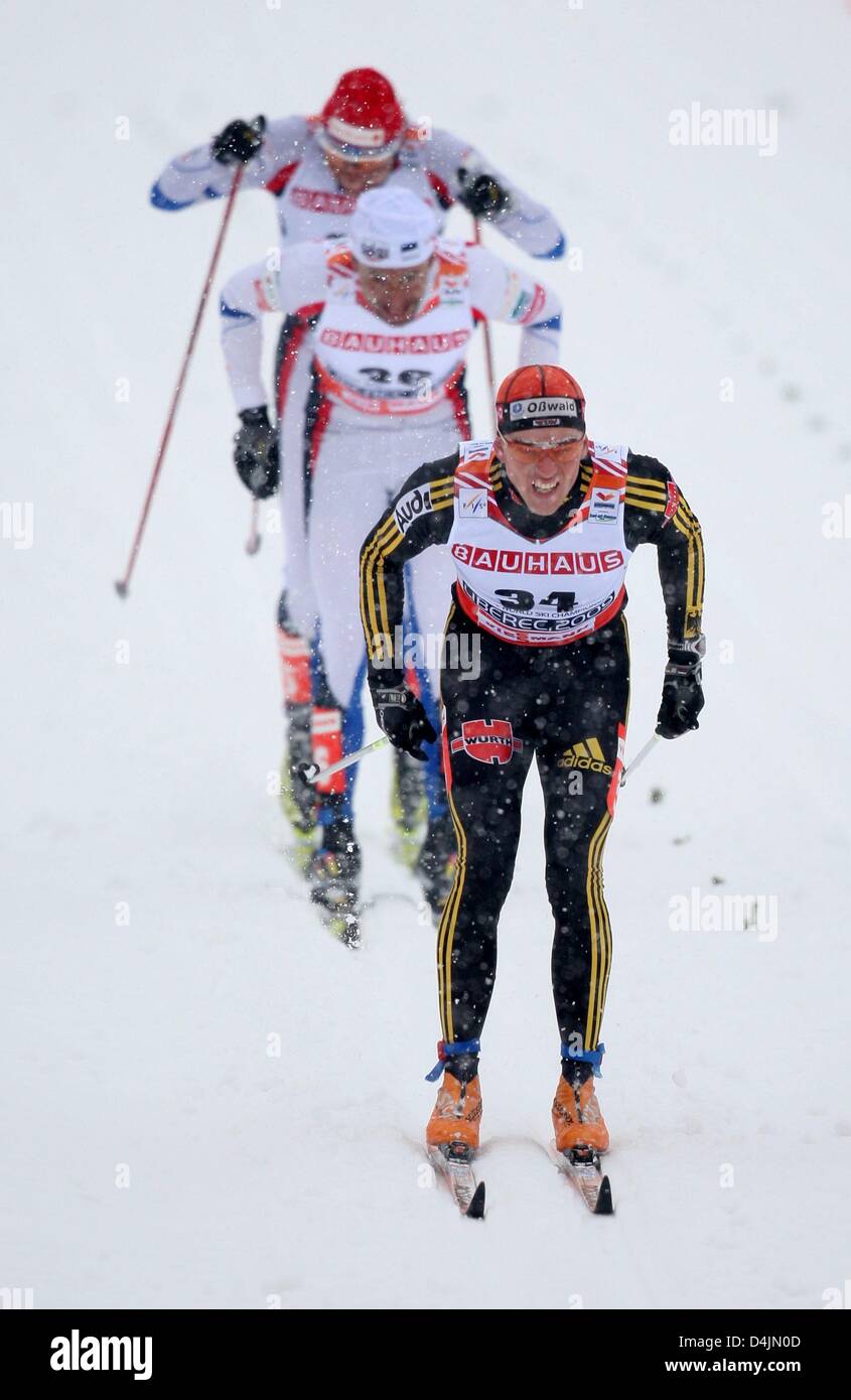 Germany?s Jens Filbrich (R) reaches the finish line in front of winner ...