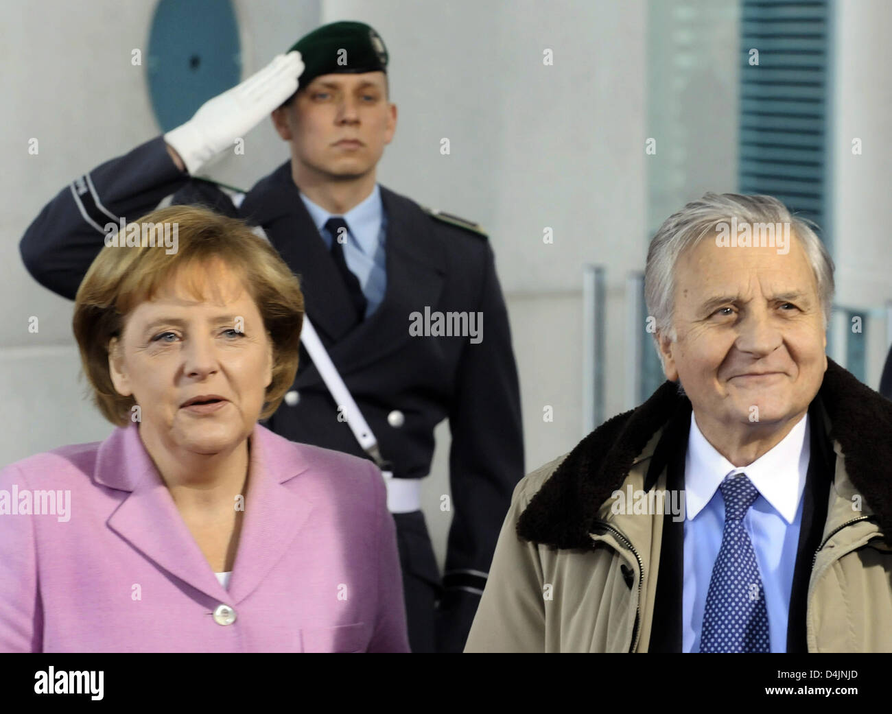 German Chancellor Angela Merkel (L) greets the President of the ...