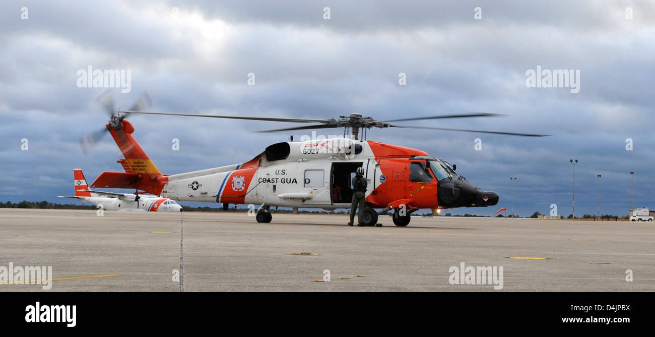 The U.S. Coast Guard prepares its MH-60T Jayhawk helicopter for rescue ...