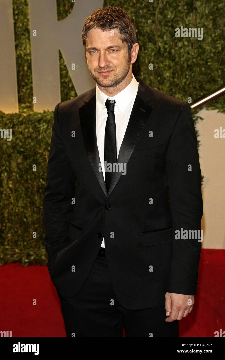 British actor Gerard Butler arrives at the Vanity Fair Oscar Party at ...