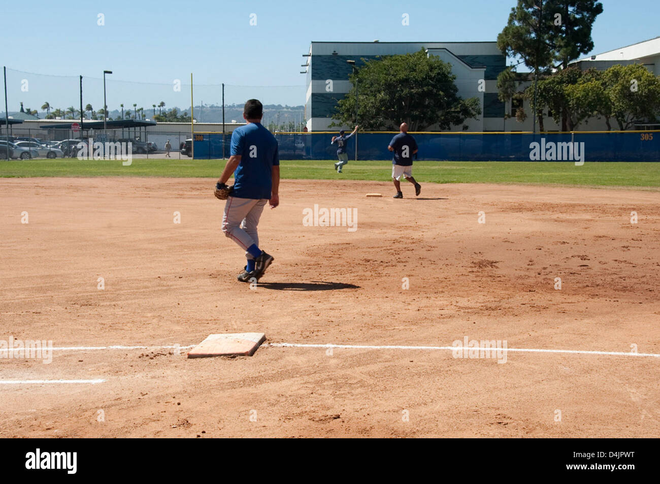 This image captures a significant moment during a Coast Guard operation ...