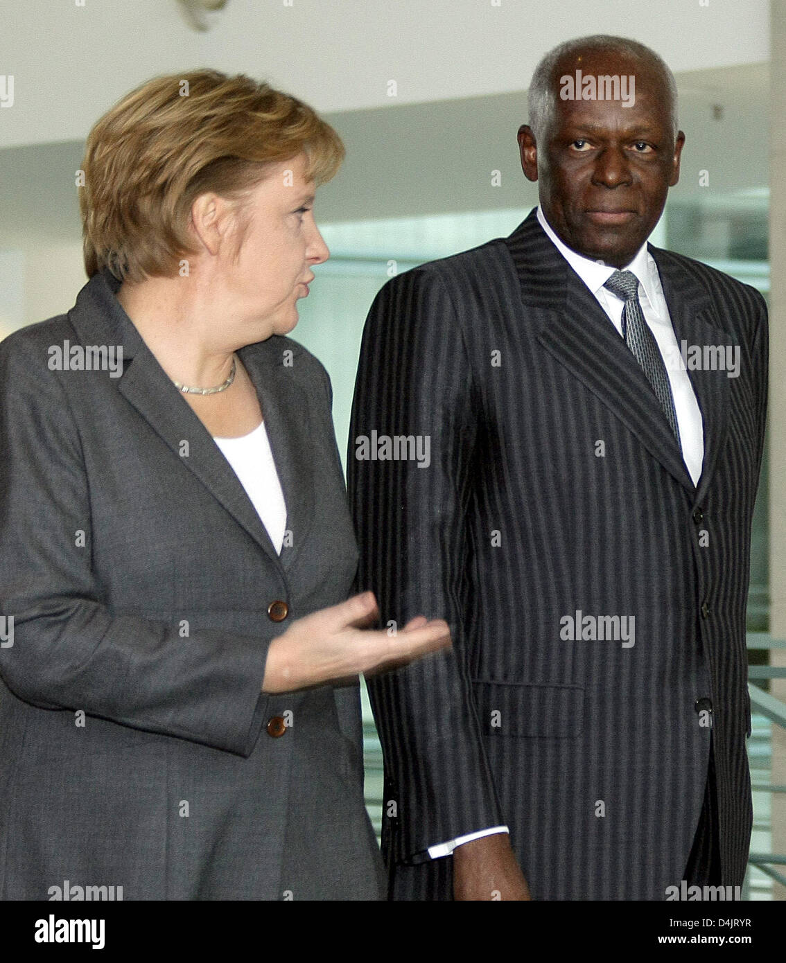 German Chancellor Angela Merkel (L) welcomes Angolan President Jose ...