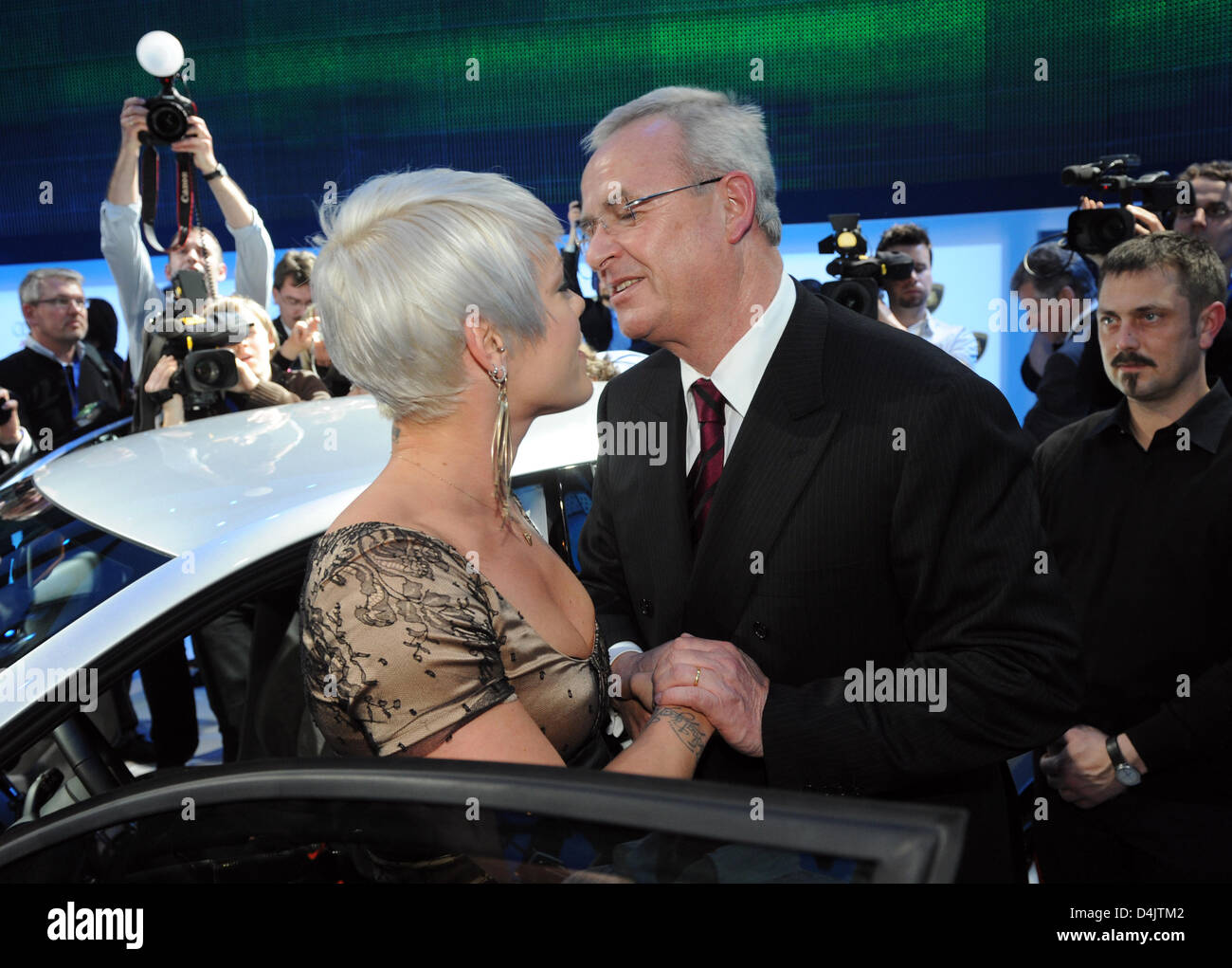 US singer Pink (L) and Volkswagen CEO Martin Winterkorn pose during the ...
