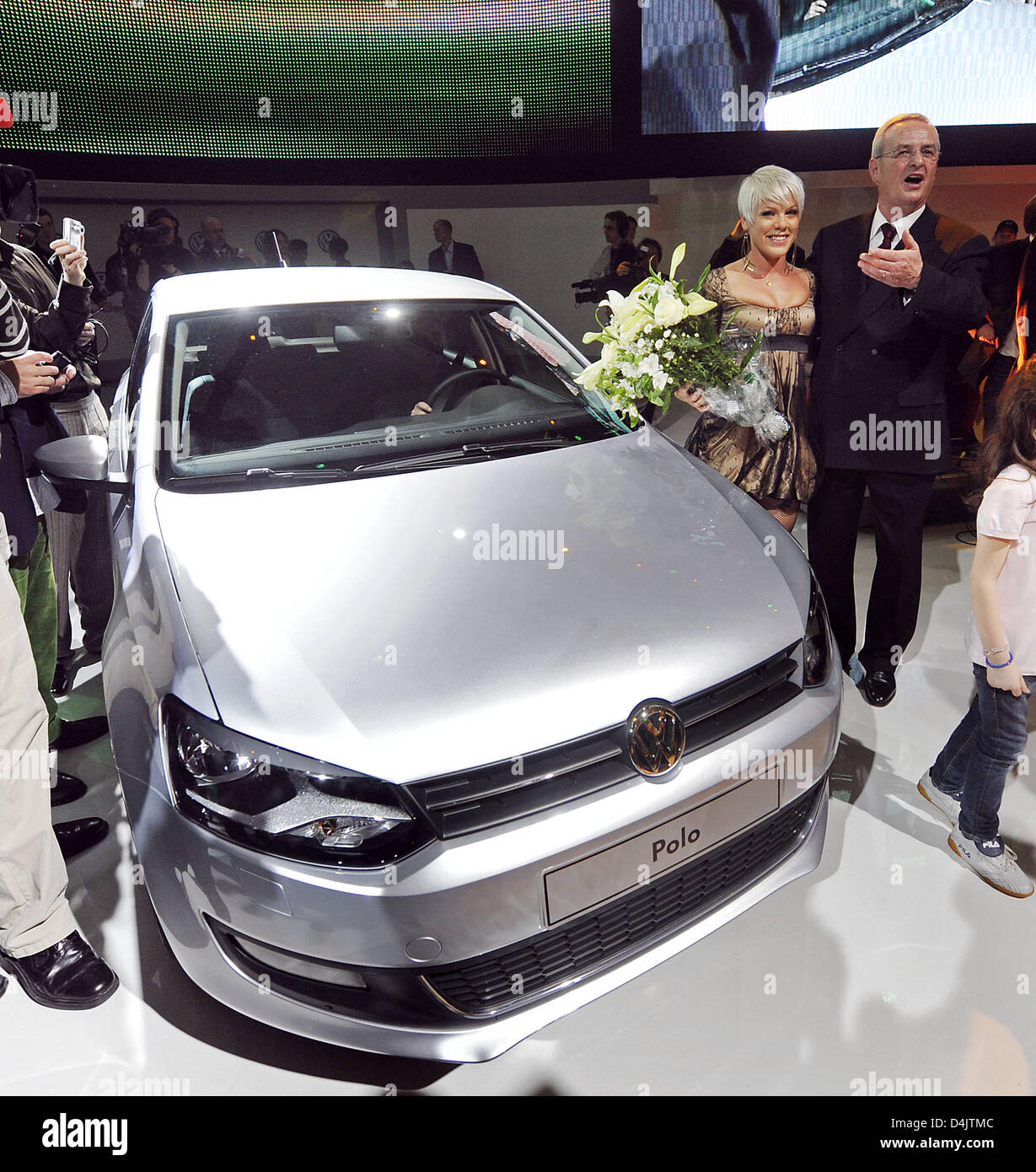 US singer Pink (L) and Volkswagen CEO Martin Winterkorn (R) pose during ...