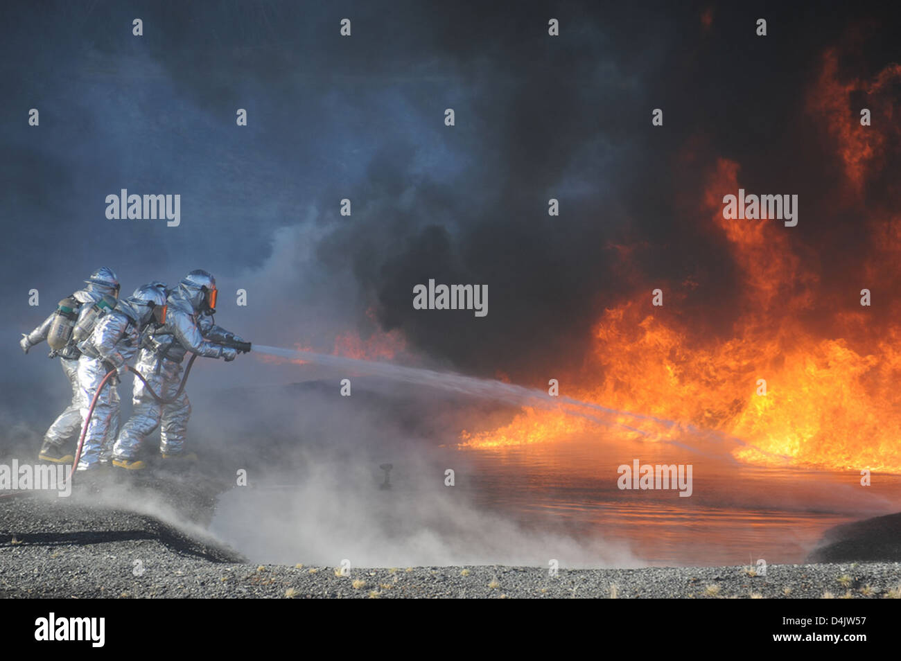 The U.S. Coast Guard Fire Department in Alaska conducts firefighter ...