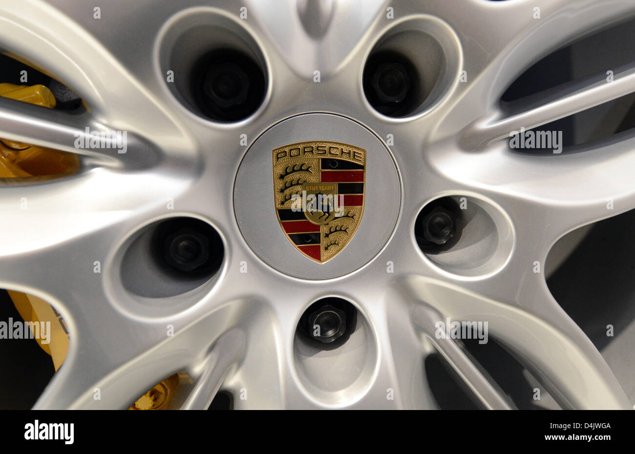 The emblem of the sports car builder Porsche is pictured on the wheel ...