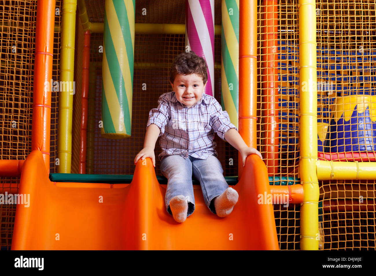 Little boy playing on playground hi-res stock photography and images ...