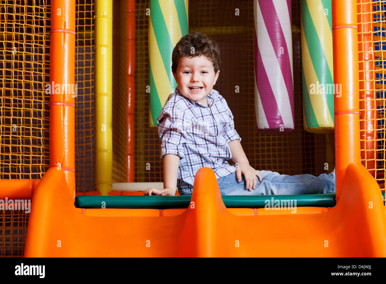 little boy playing on playground Stock Photo - Alamy