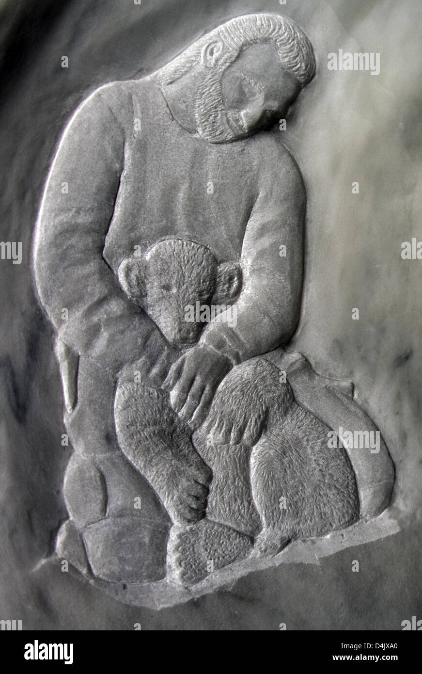 A picture of keeper Thomas Doerflein holding polar bear ?Knut? is cut ...