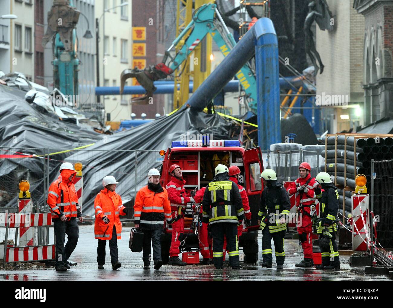 Firefighters and rescue teams seen at Cologne?s collapsed Historic City ...