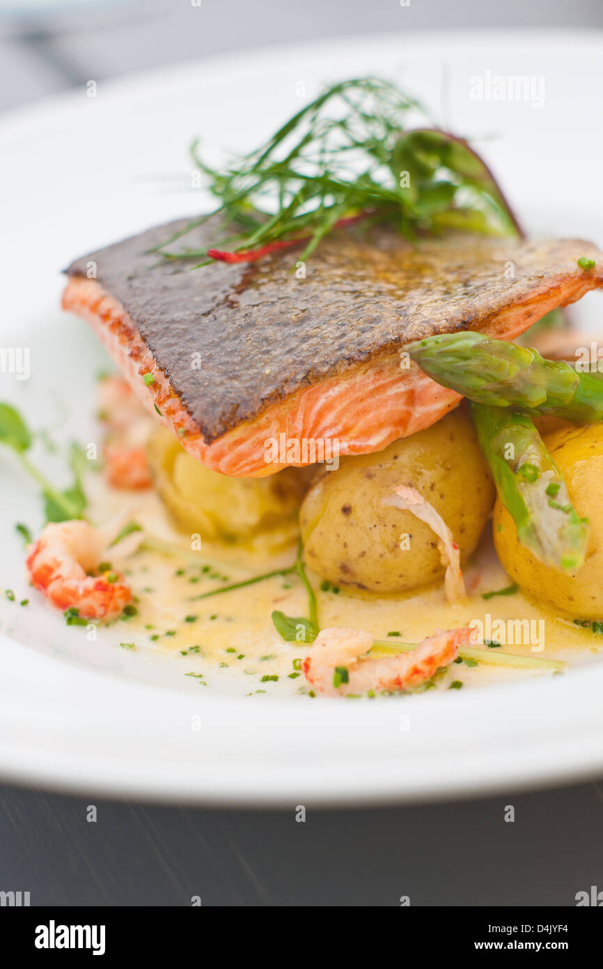 Plate of fish with potatoes Stock Photo - Alamy