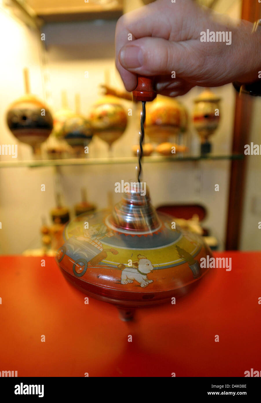 A colourful humming-top made of sheet dated 1920/30 pictured at the toy ...