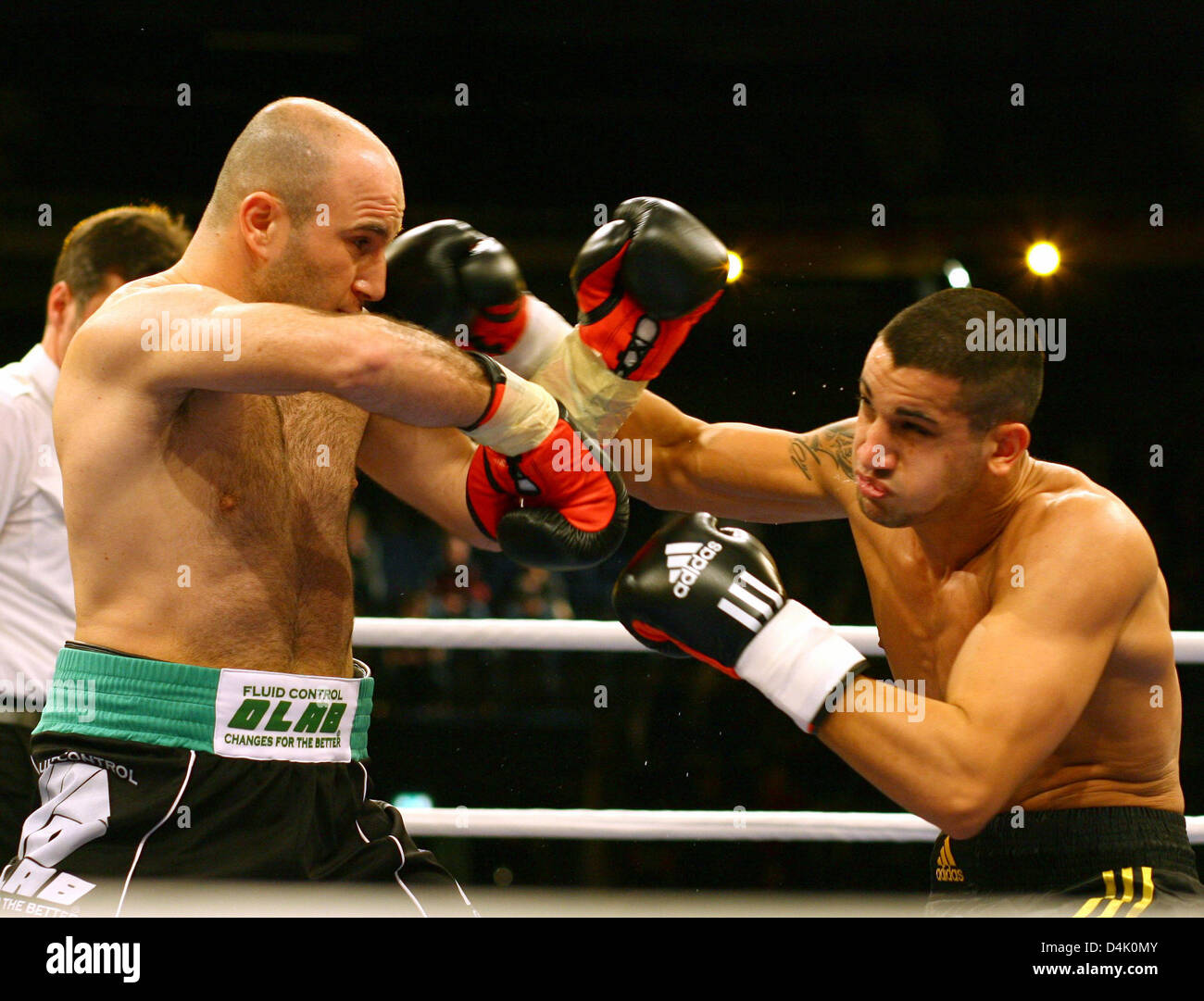 Austrian middleweight boxer Marcos Nader (R) in action against Italian ...