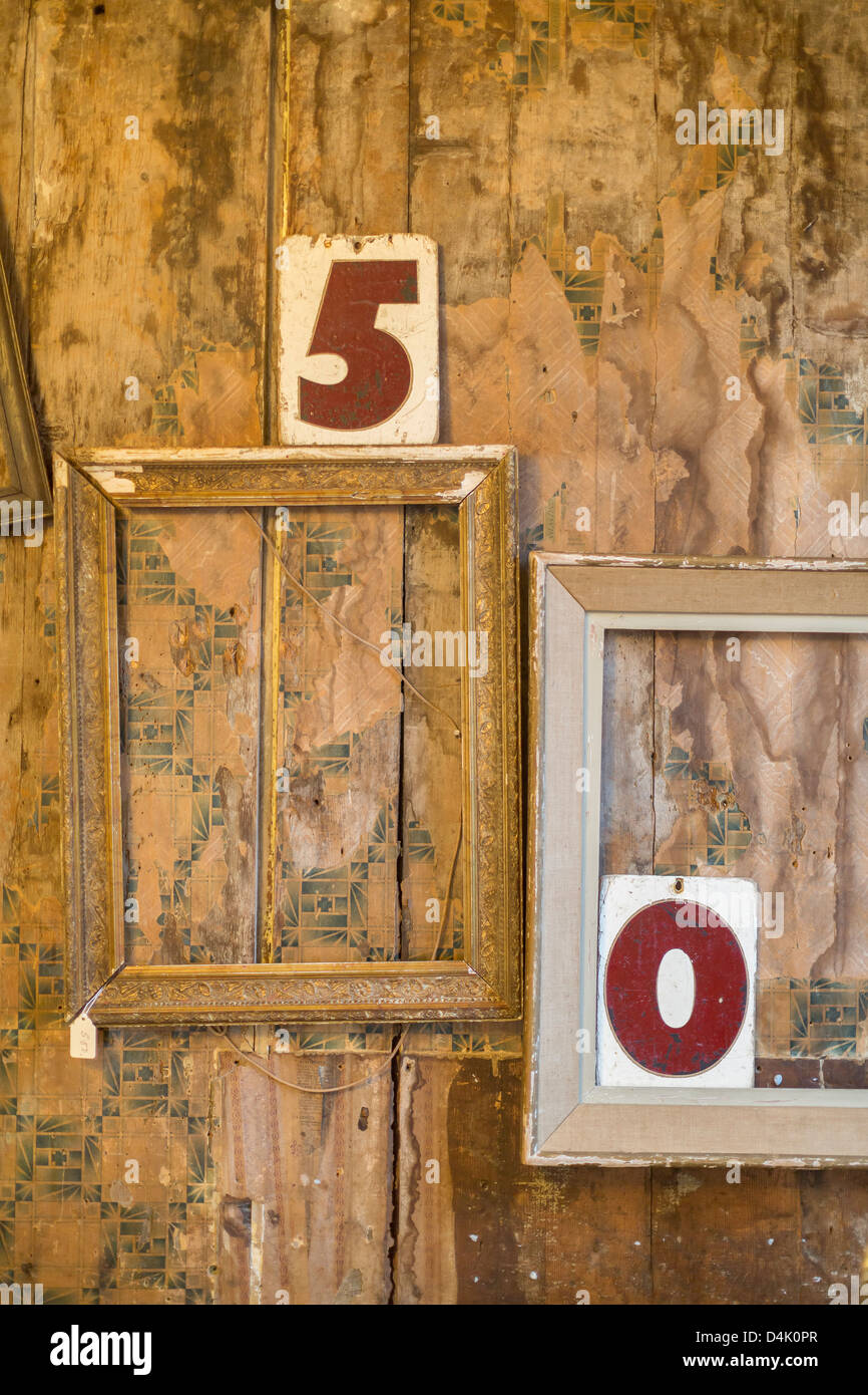 Empty picture frames and numbers on wall Stock Photo - Alamy