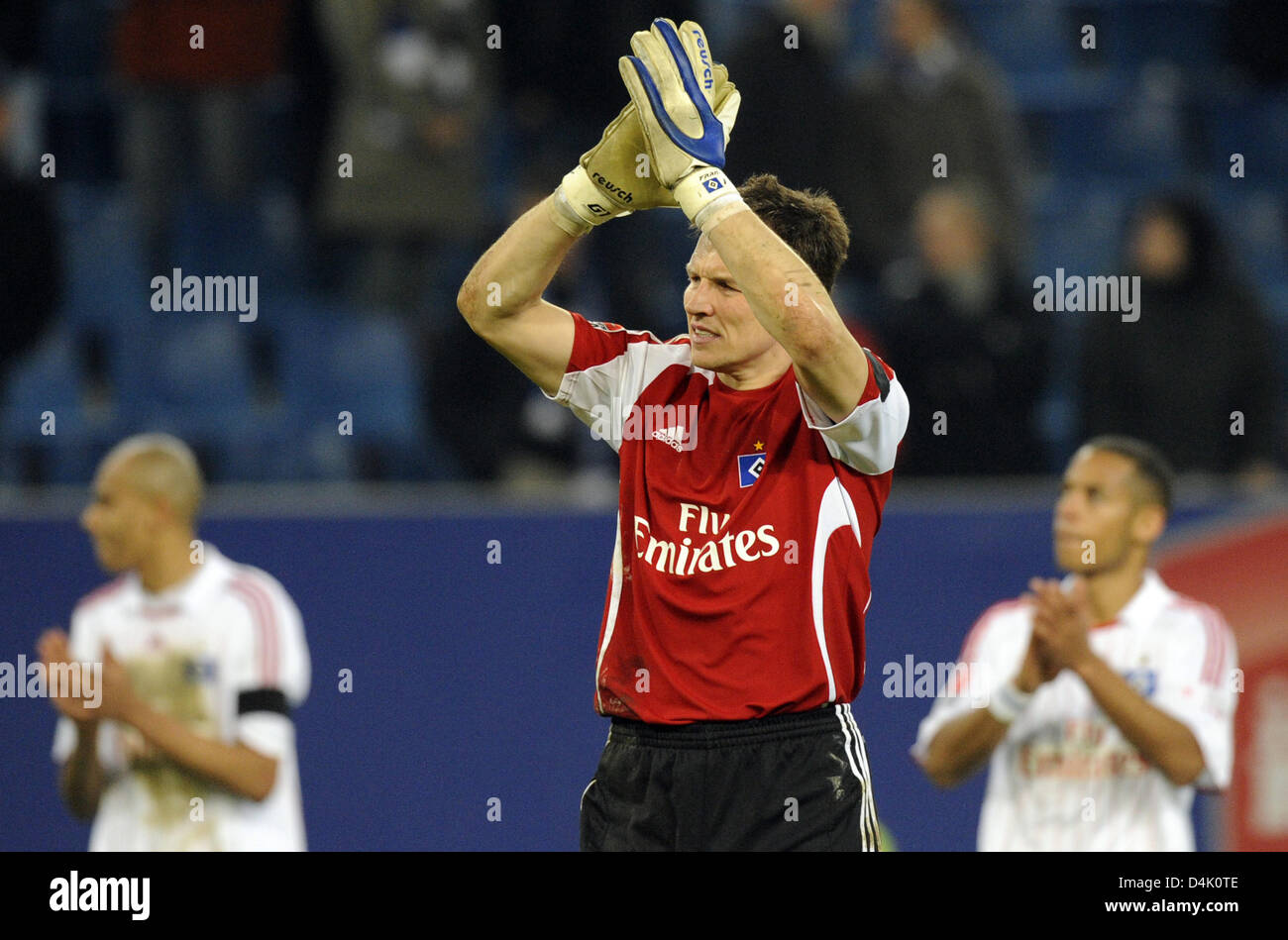 Hamburg?s goalkeeper Frank Rost (C) and teammates celebrate after the ...