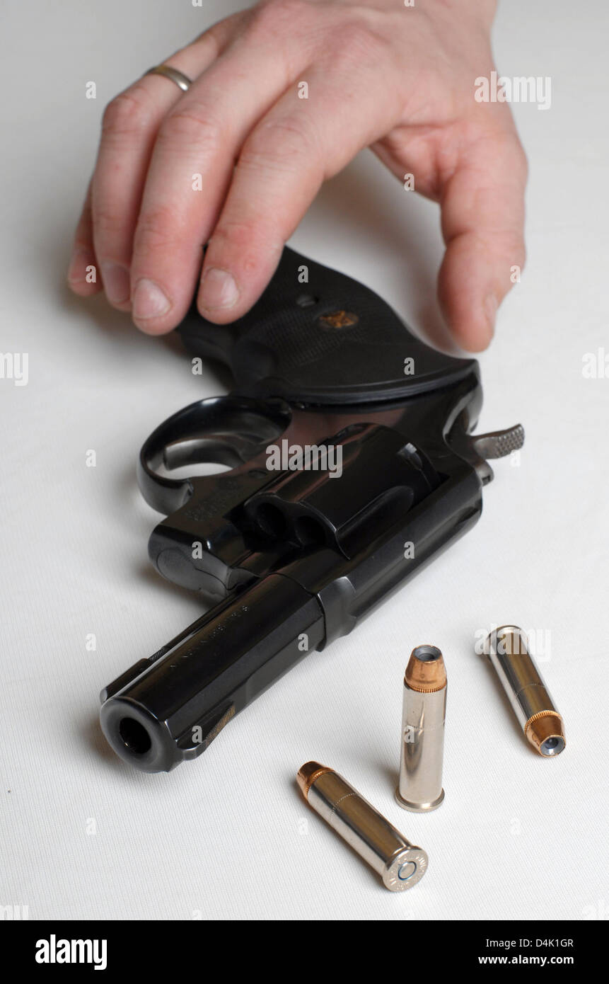 A hand reaches for a revolver by Smith & Wesson in Butzbach near ...