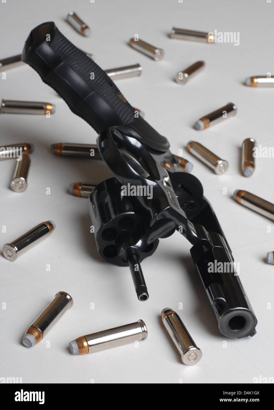 A revolver by Smith & Wesson and cartridges lie in Butzbach near ...